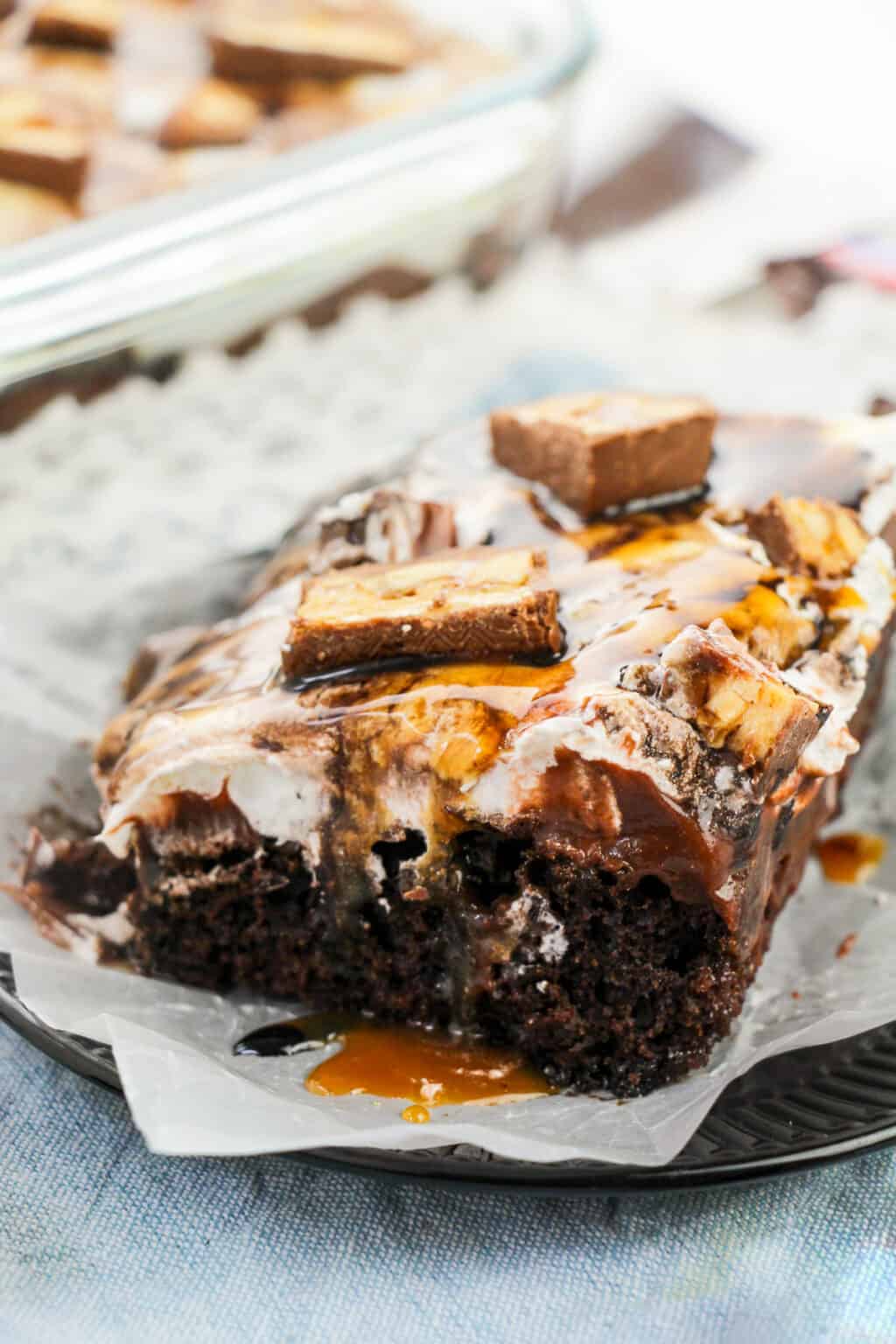 Easy Snickers Poke Cake Recipe