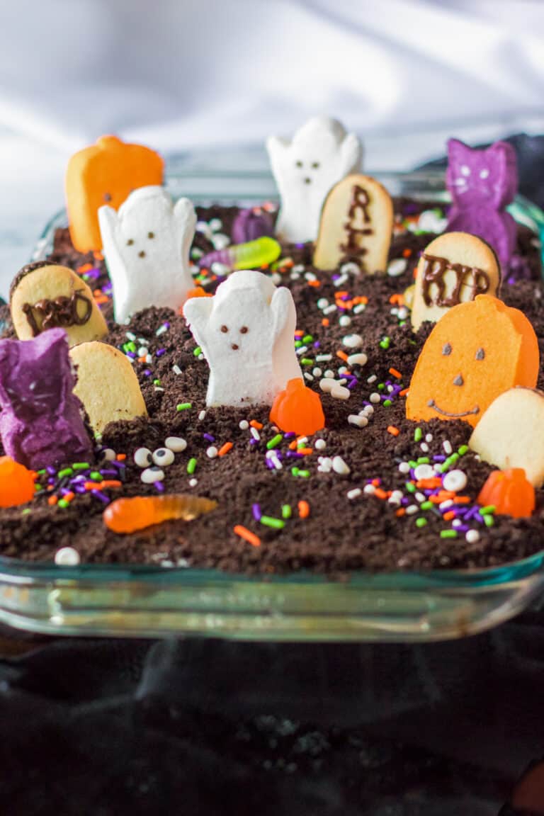 Ghosts in the Graveyard Dessert (a Halloween Poke Cake)